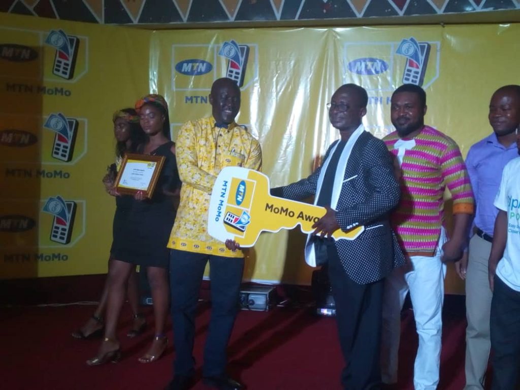 63-year old wins ultimate prize as MTN rewards Mobile Money agents in ...
