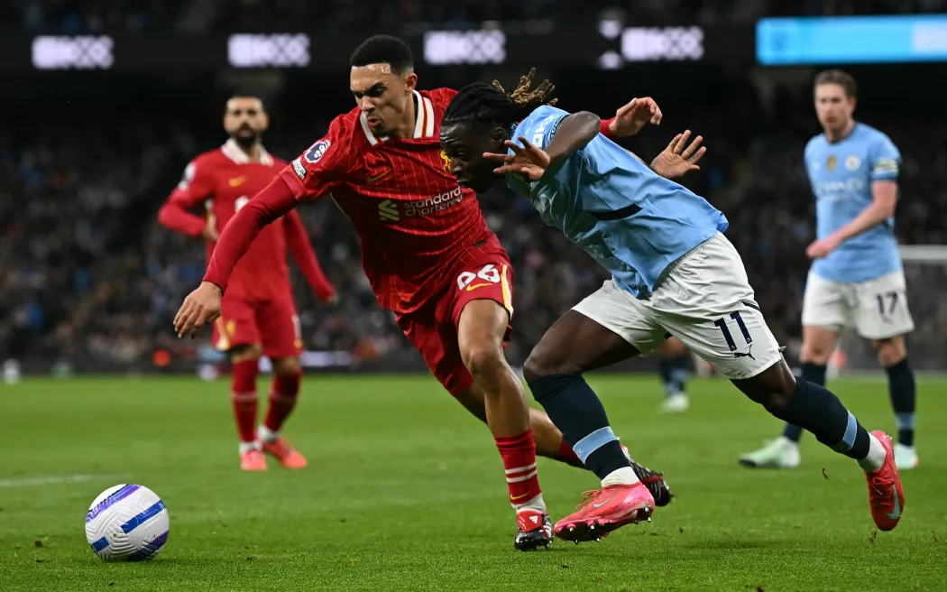 Liverpool beat Man City to extend lead at top to 11 points